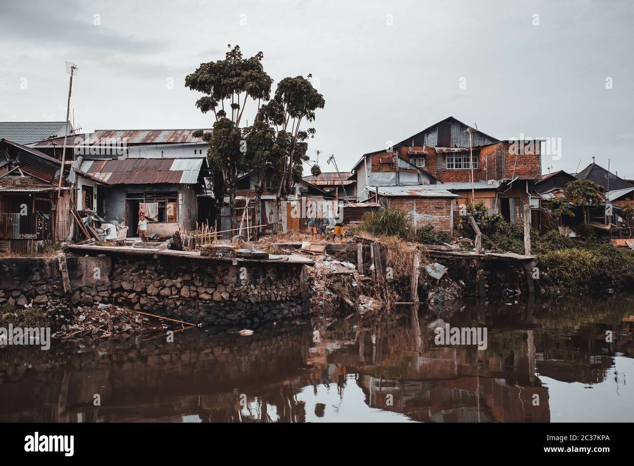 Poor houses and local people in Kota Manado ghetto, Indonesia Stock ...