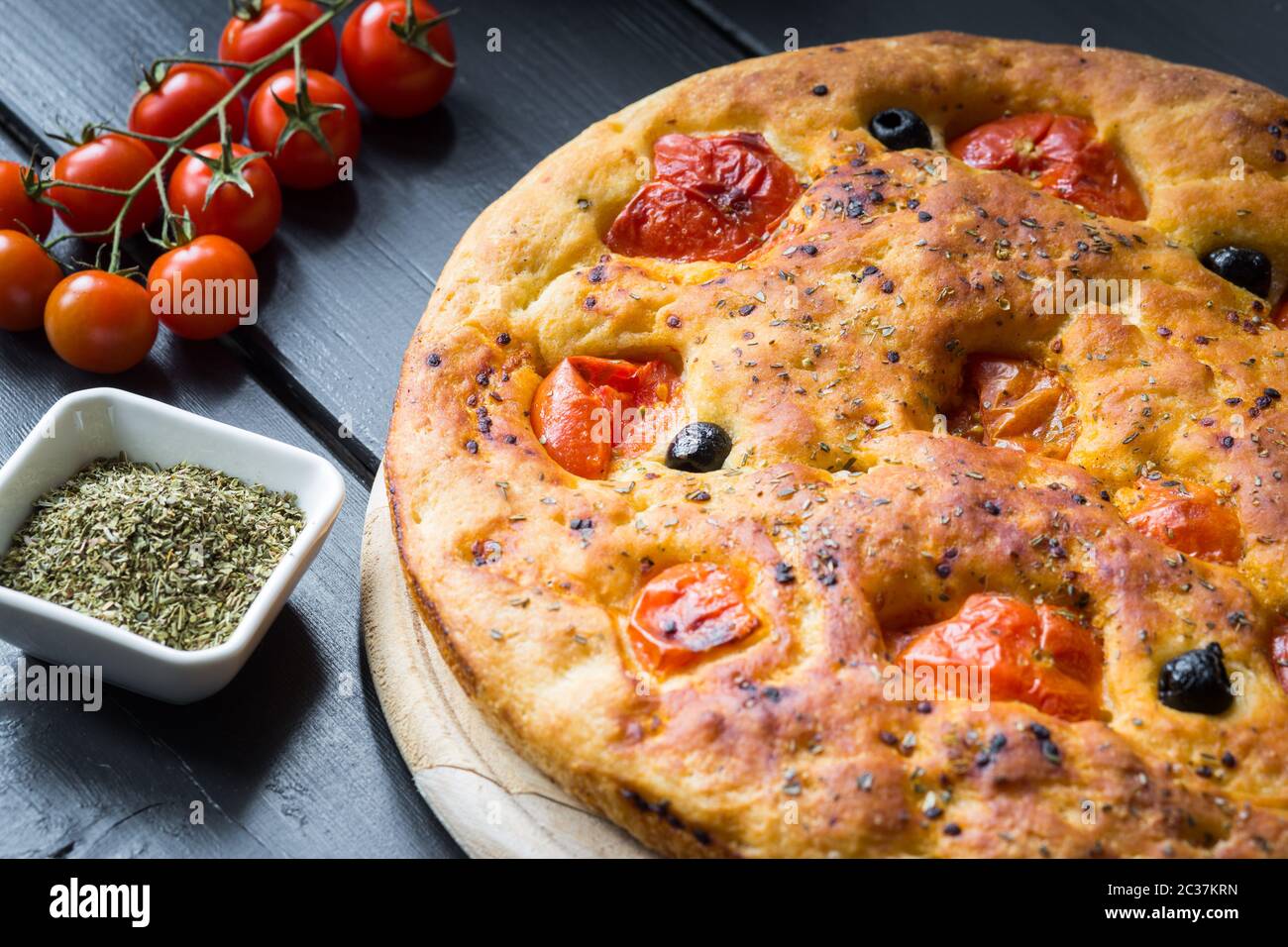 Homemade focaccia on rustic board Stock Photo - Alamy
