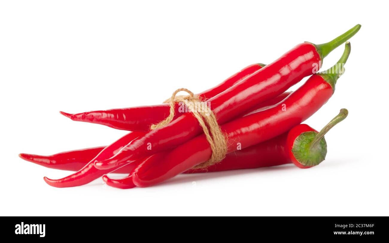 Bunch of red hot pepper isolated on white background Stock Photo - Alamy