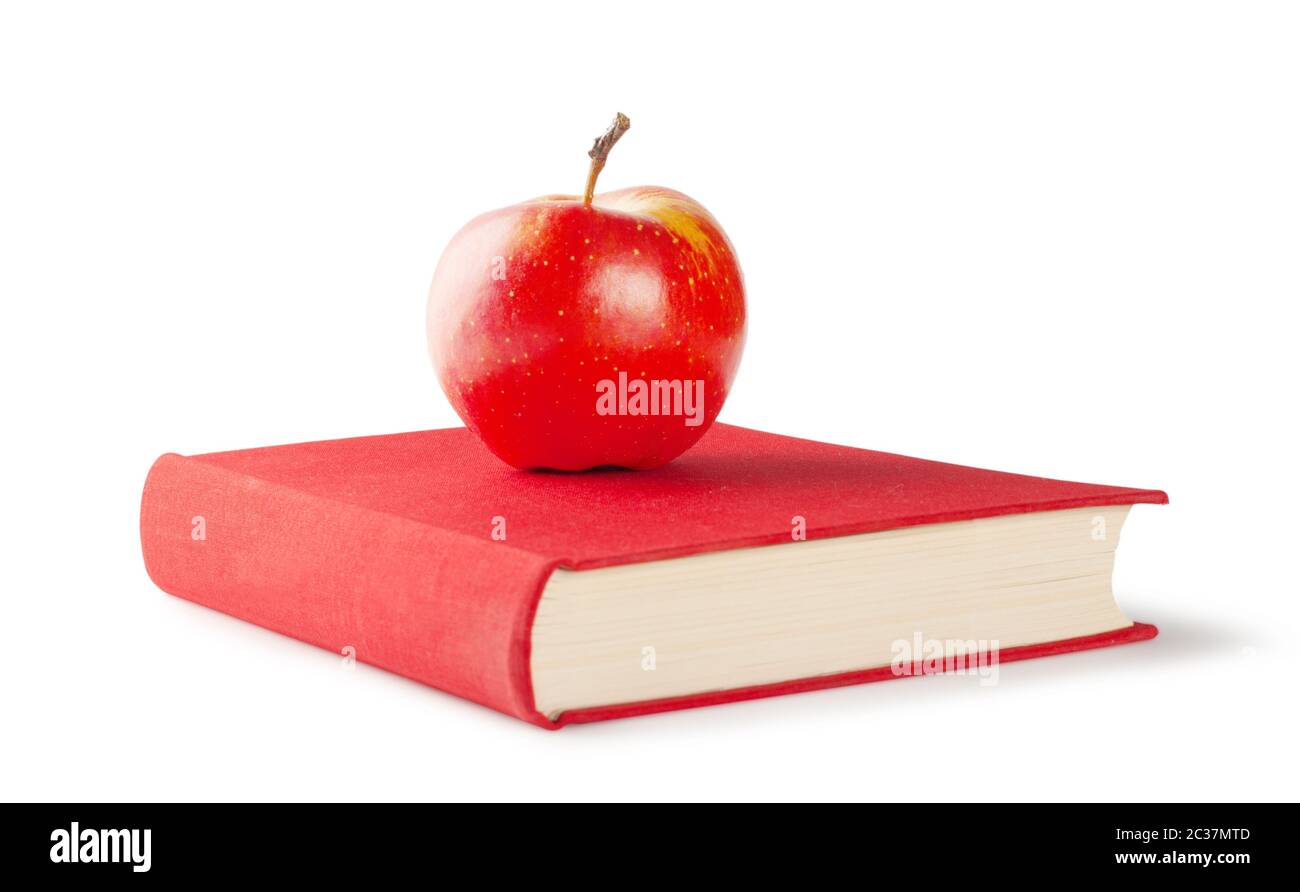 Book with apple isolated on white background Stock Photo - Alamy