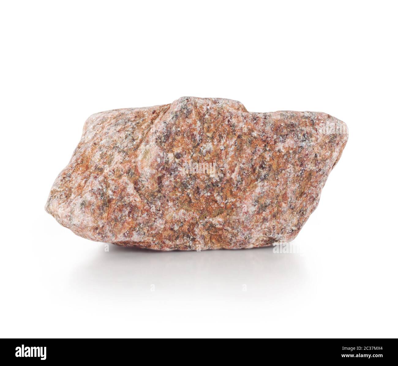 Burgundy rough stone isolated on a white background Stock Photo - Alamy