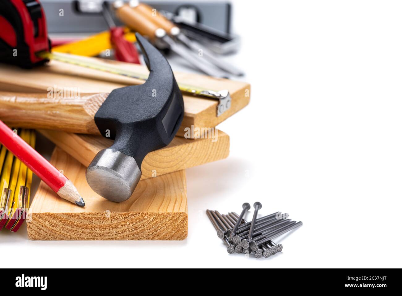Close-up of hammer and carpenter's tools on a white background ...