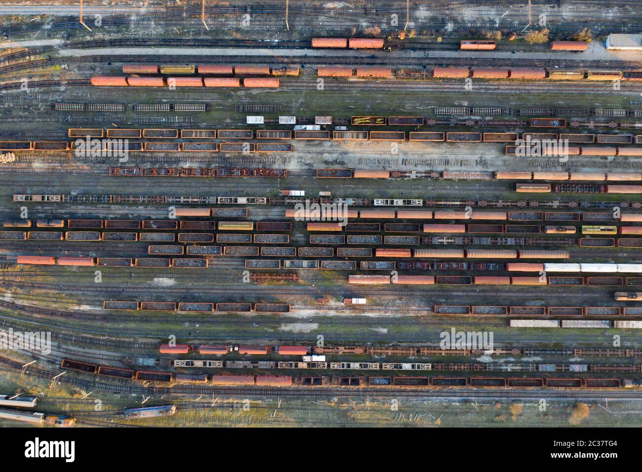 Aerial view of various railway carriage trains with goods on the ...