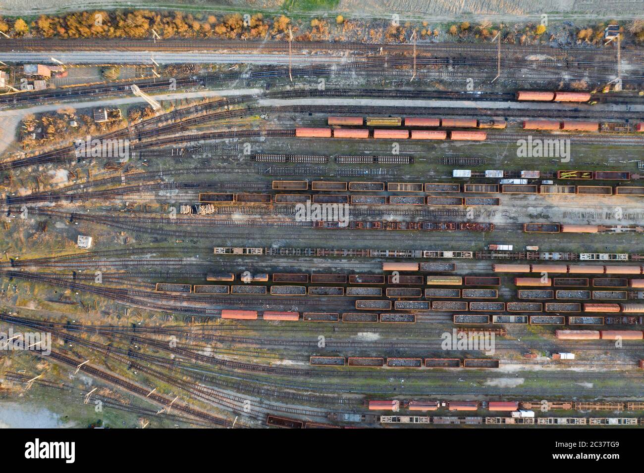 Aerial view of various railway carriage trains with goods on the ...