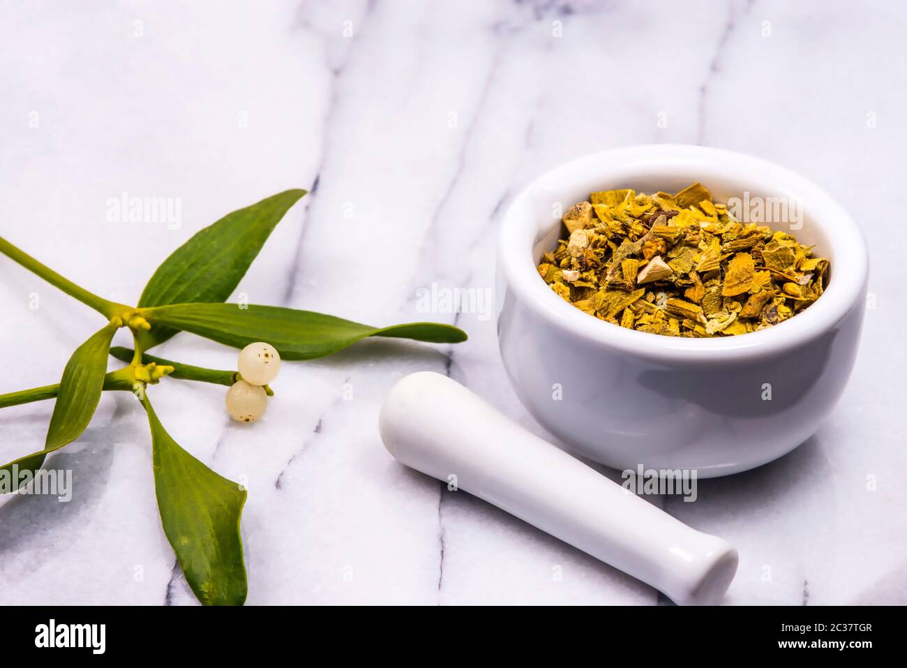 mistletoe, medicinal herb dried and fresh leaves with mortar Stock ...