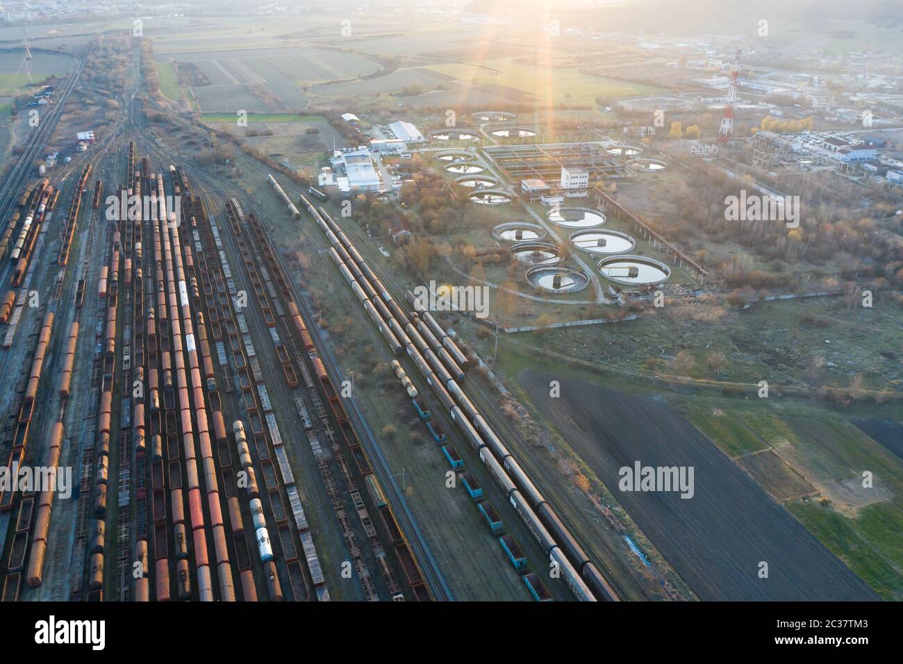 Aerial view of various railway carriage trains with goods on the ...