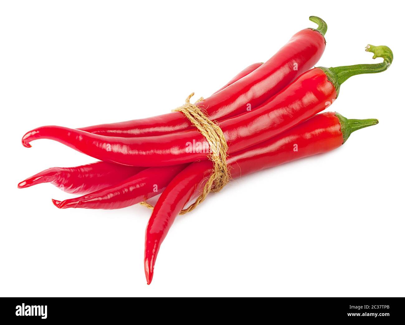 Bunch of red peppers tied with rope isolated on white background Stock ...