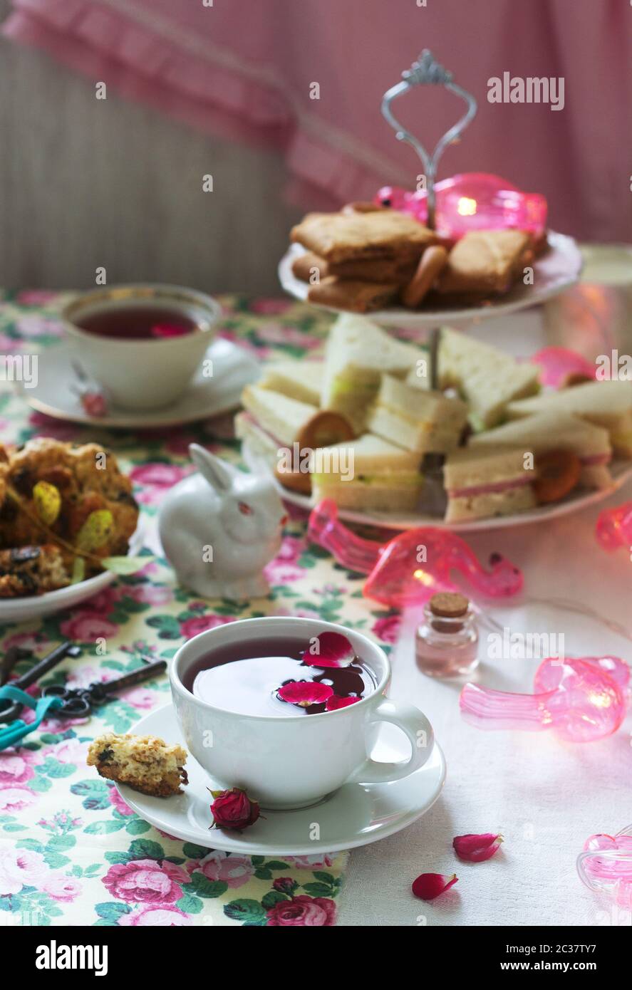 Traditional English tea party in a fabulous decoration. Rustic style ...
