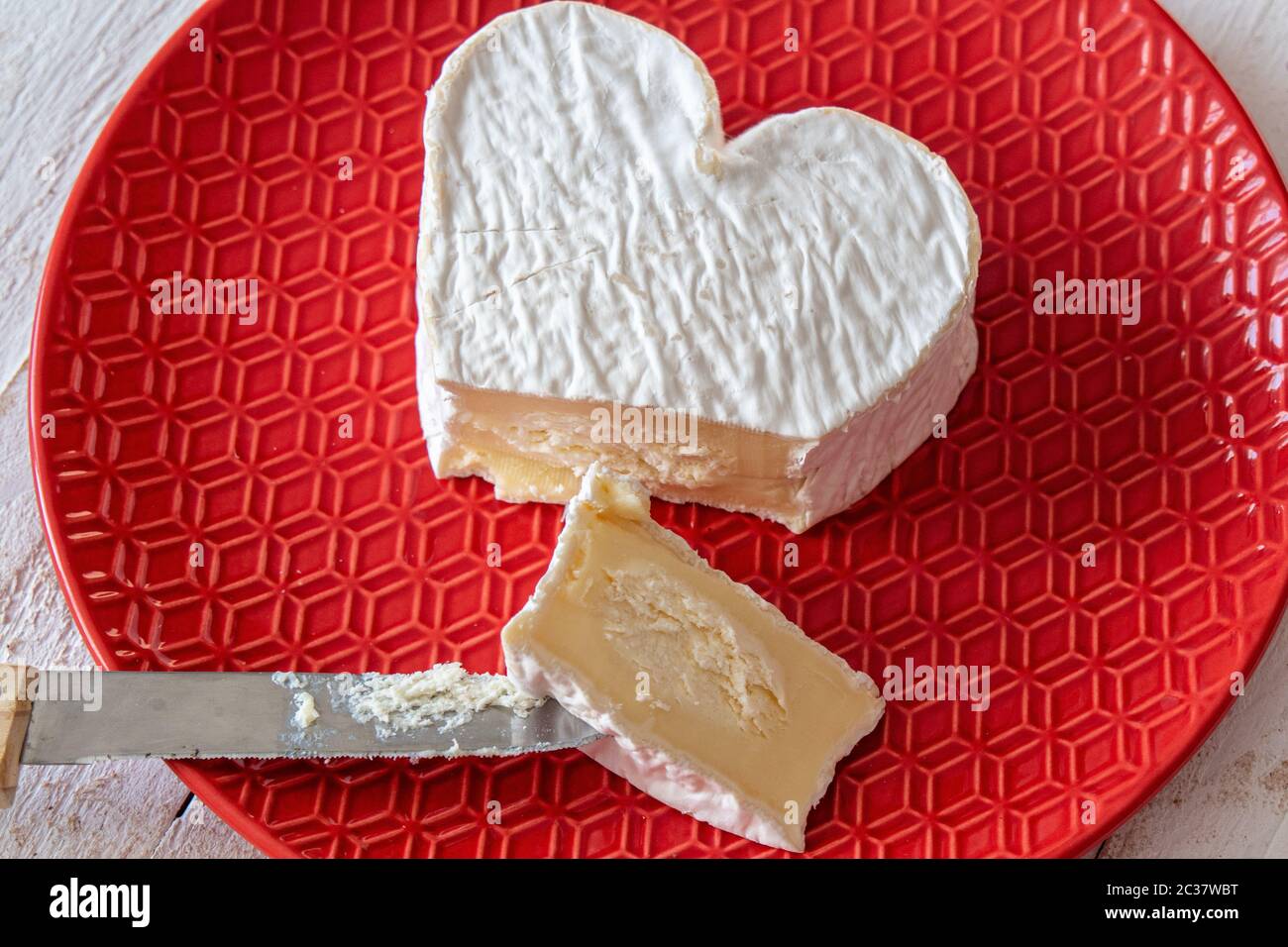 delicious French Neufchatel cheese shaped heart Stock Photo - Alamy