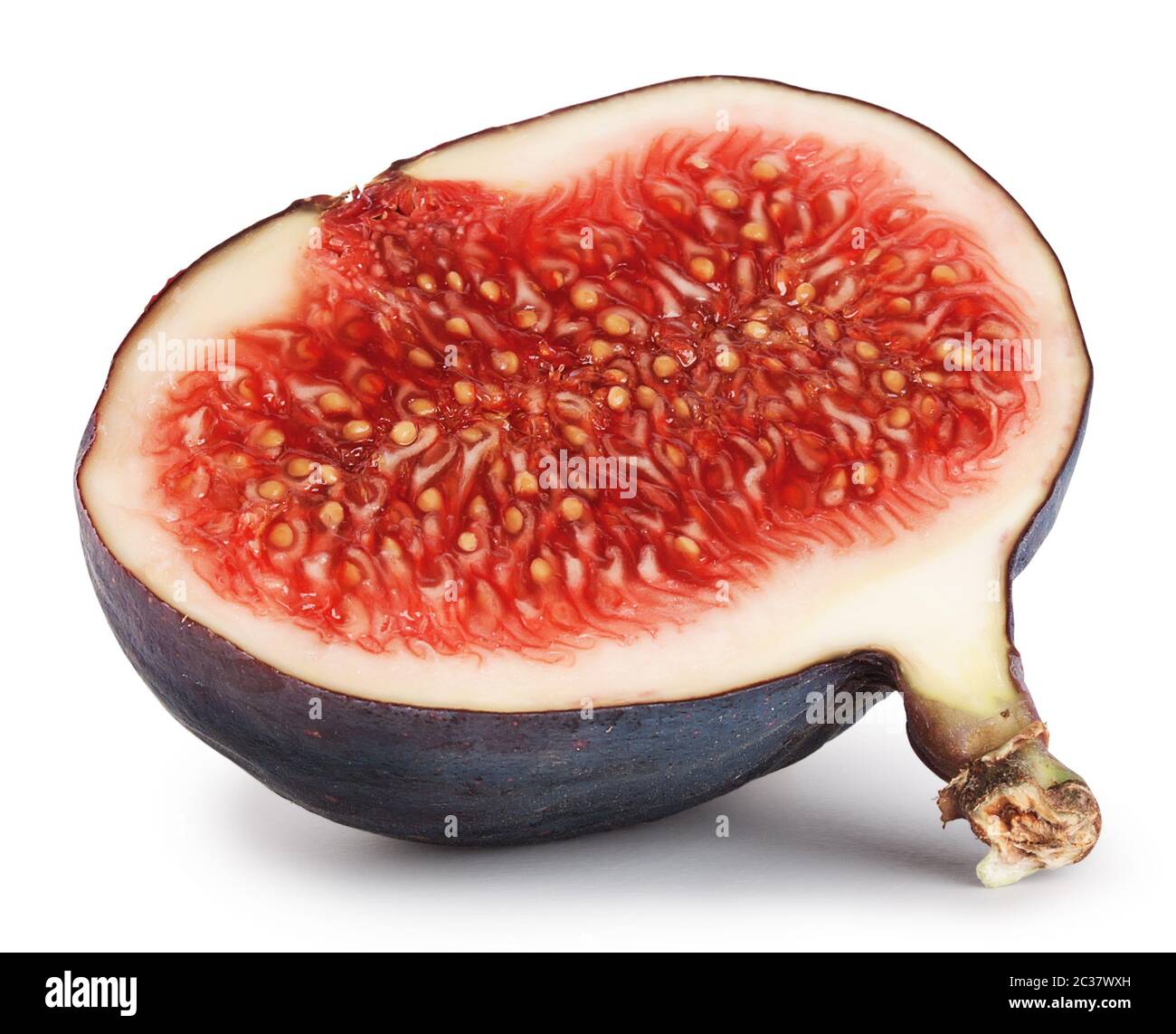 Half figs with seeds isolated on white background Stock Photo - Alamy
