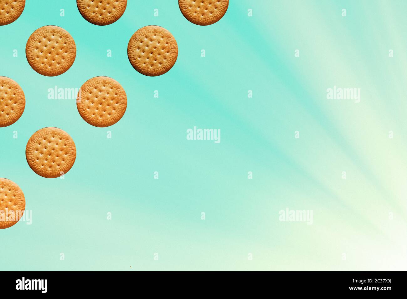 pattern with framed round cookies on a light blue background with ...