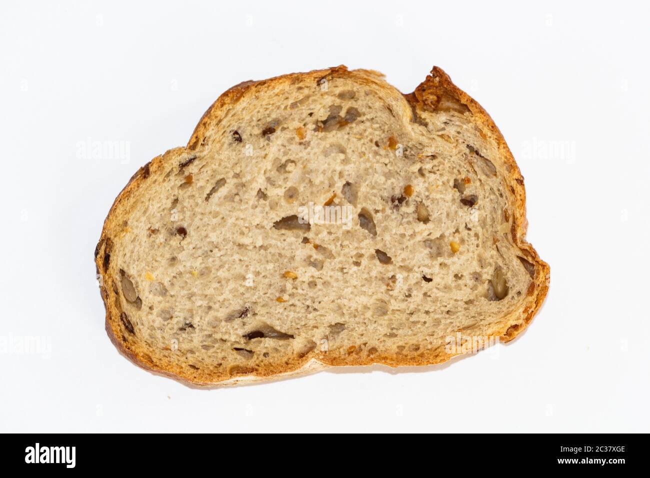Slice of wholemeal bread with grain on a white background Stock Photo ...