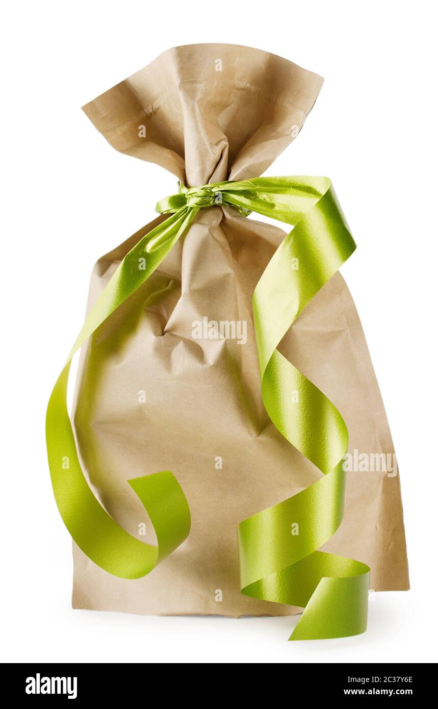 Gift bag with ribbon isolated on white background Stock Photo - Alamy