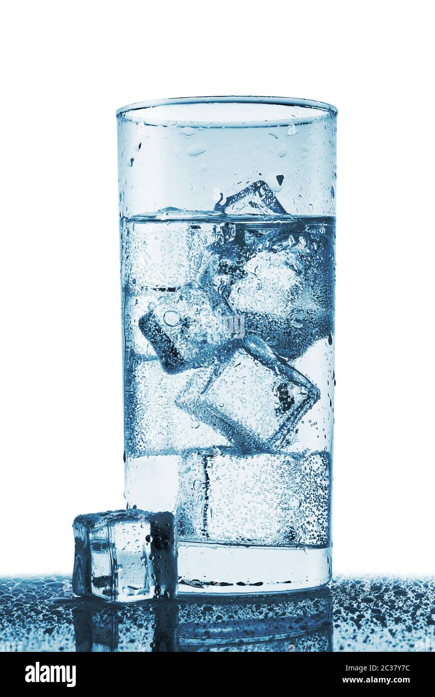 Glass of cold water with droplets and ice isolated on white background ...