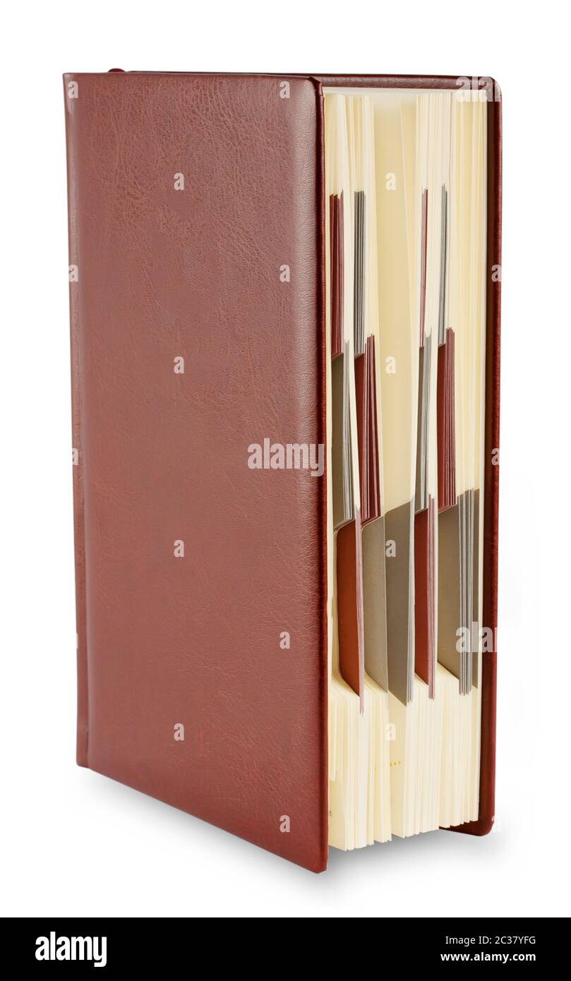 Leather diary standing upright isolated on white background Stock Photo ...