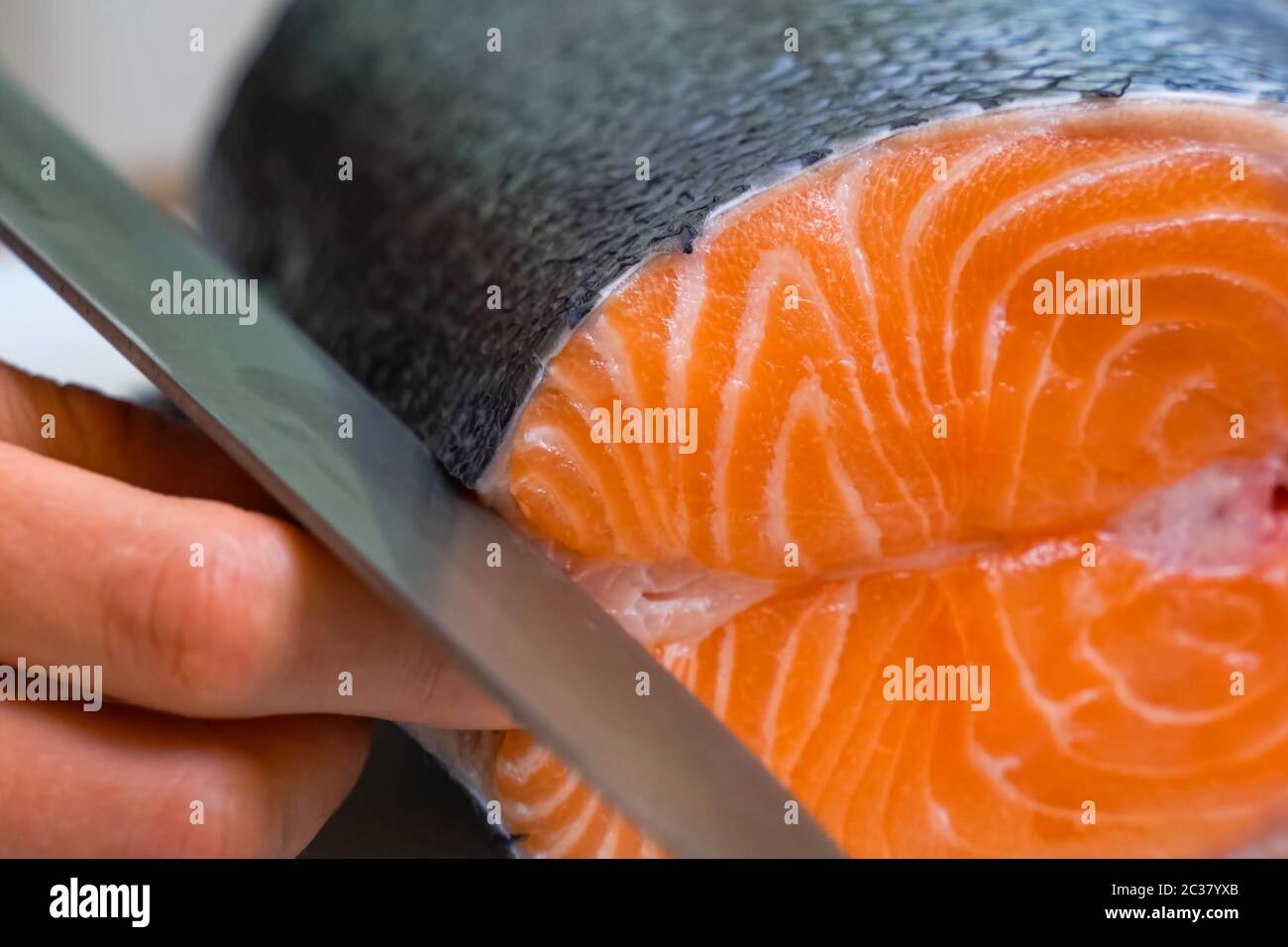 a Butchering salmon, piece of salmon red fish meat Stock Photo - Alamy