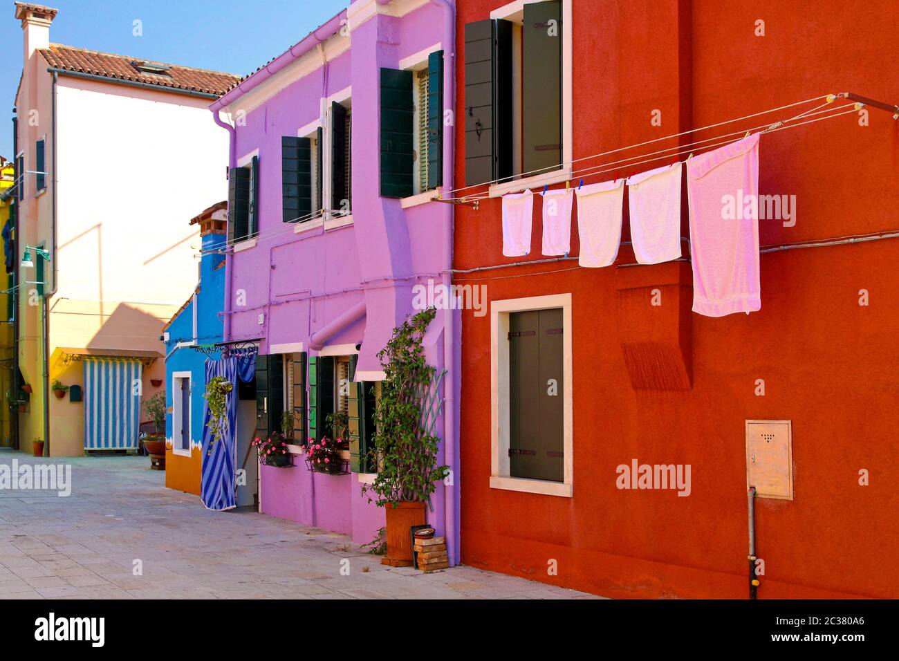 Old retro Mediterranean street with colorful houses Stock Photo - Alamy