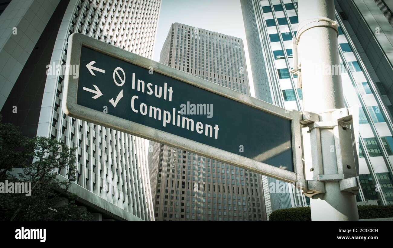 Street Sign Compliment versus Insult Stock Photo - Alamy