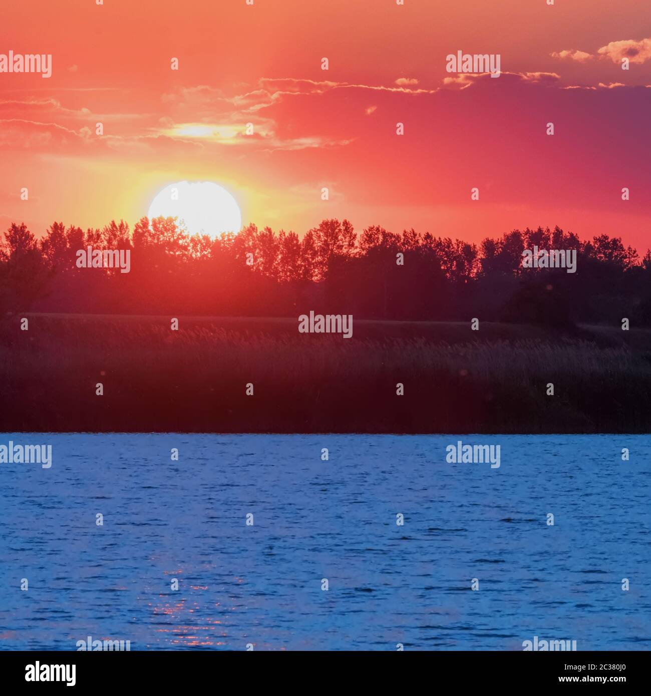 Sunset Scene over Lake, Water Surface Sunset Stock Photo - Alamy