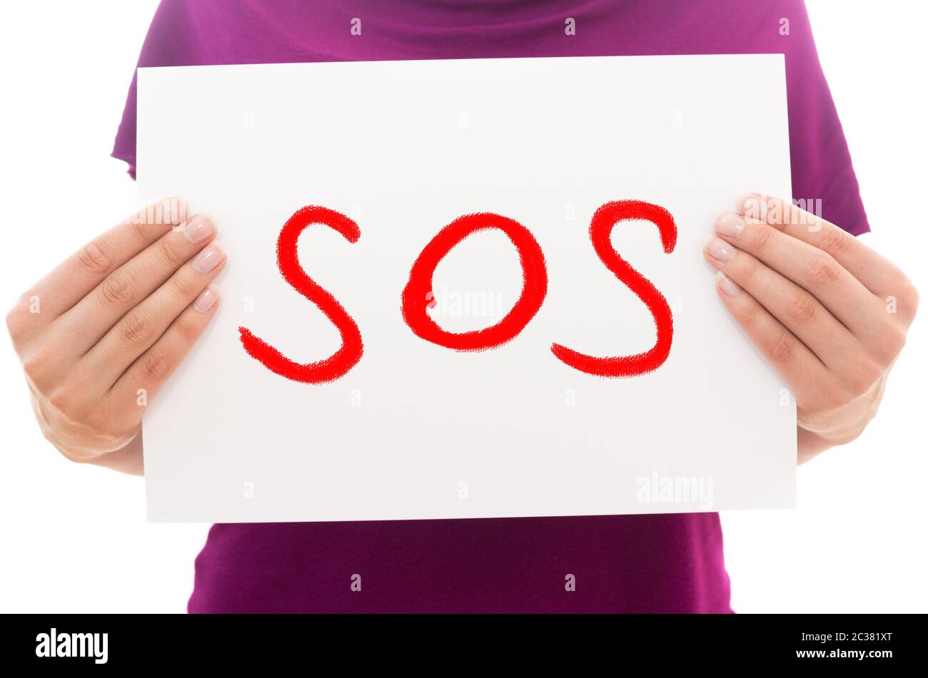 Girl holding white paper sheet with text SOS Stock Photo - Alamy