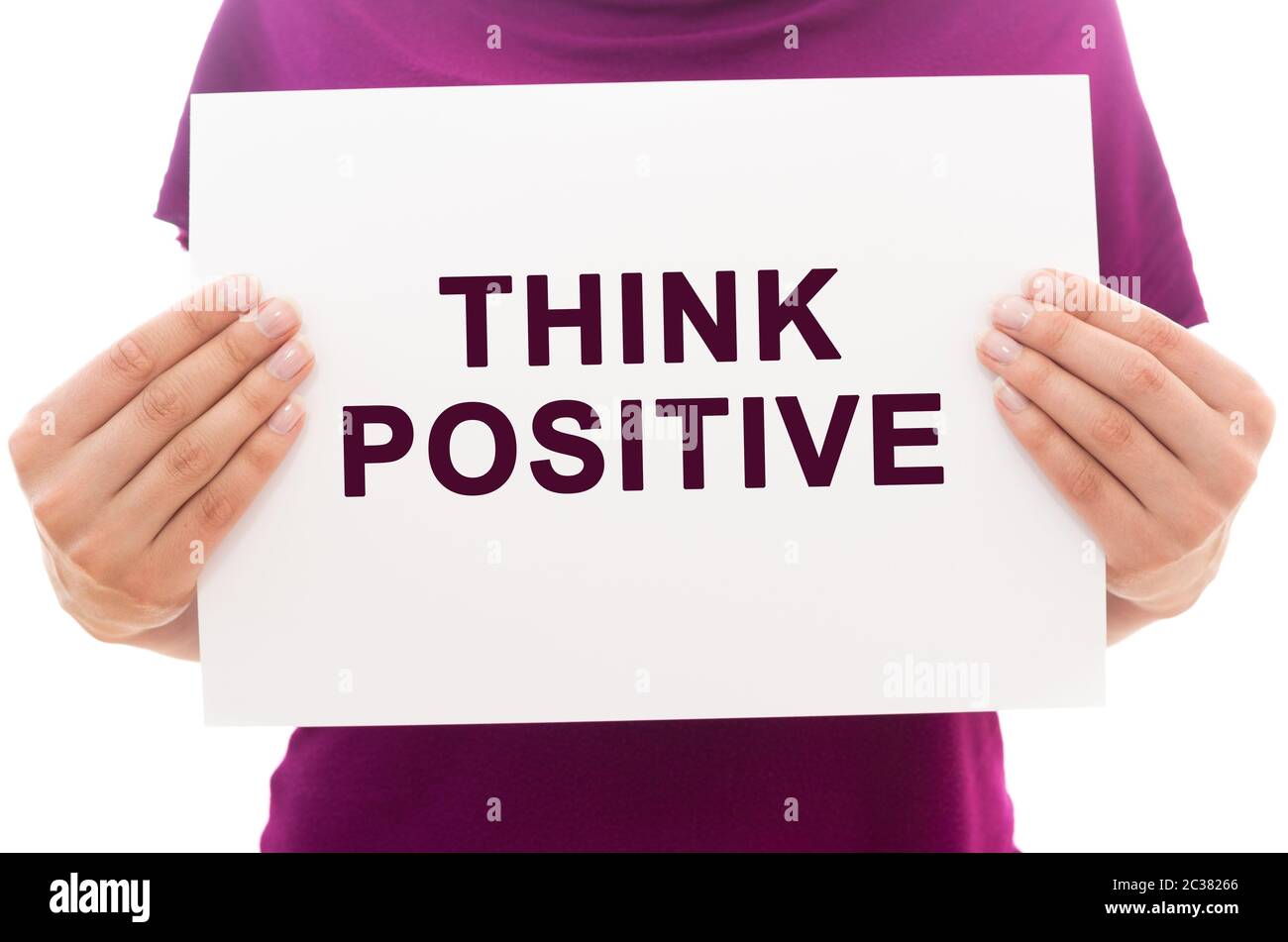 Girl holding white paper sheet with text Think positive Stock Photo - Alamy
