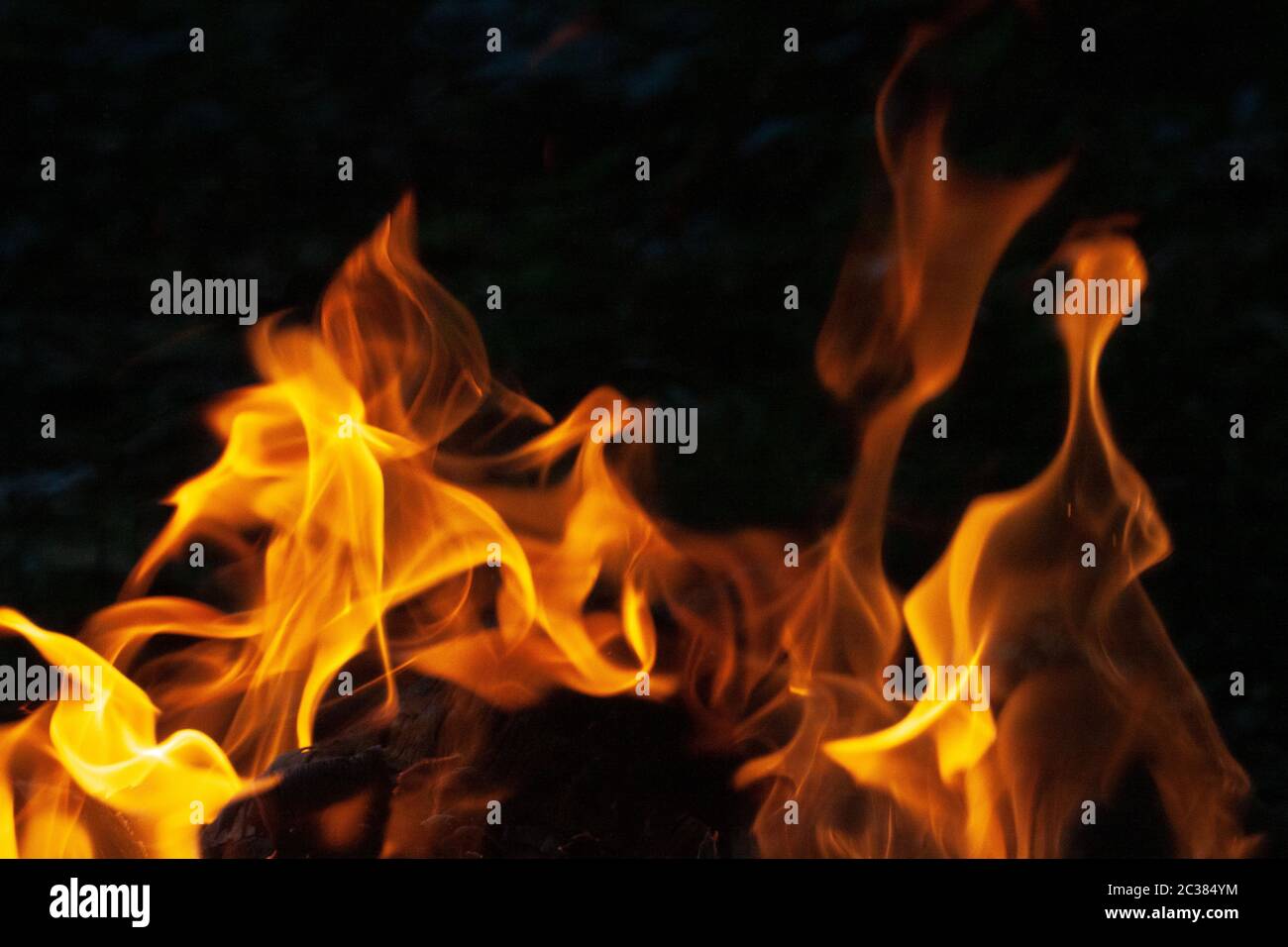 blaze fire flame texture background. A blurry photo of a fireundefined ...
