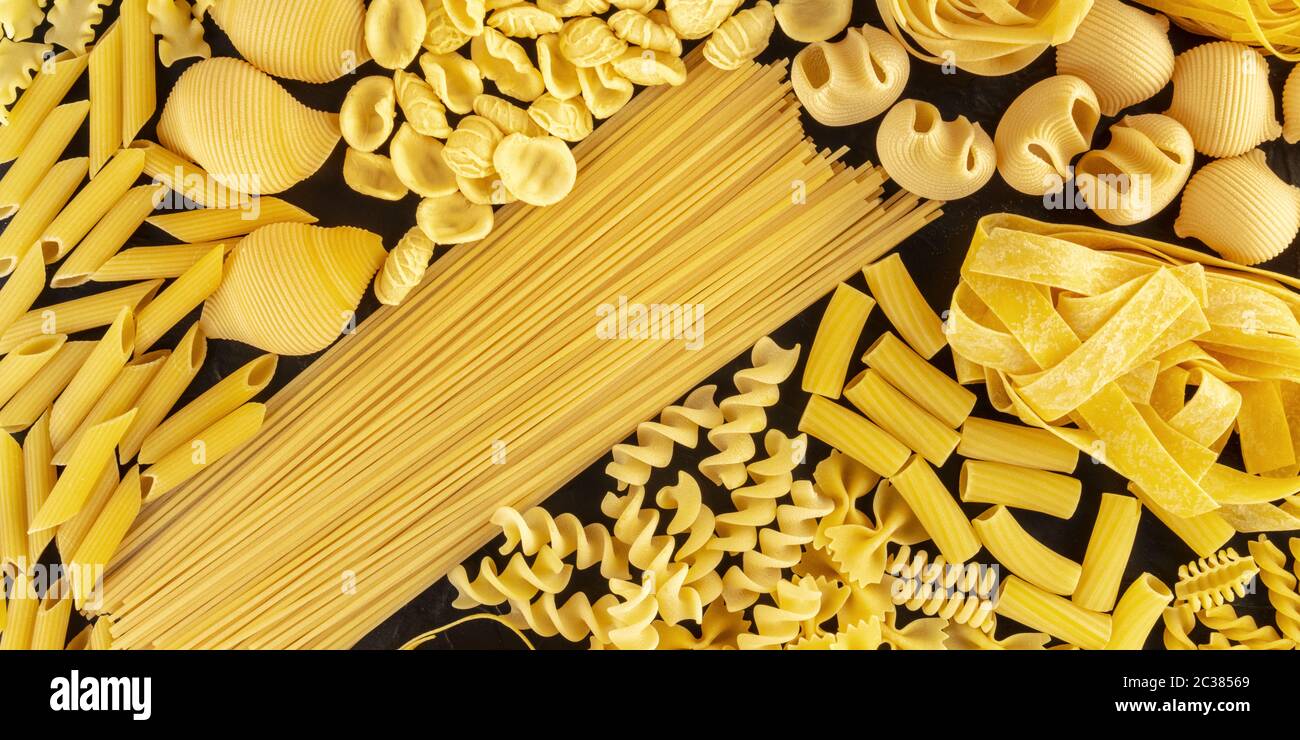 Pasta variety panorama, many different pasta sorts, shot from above on ...