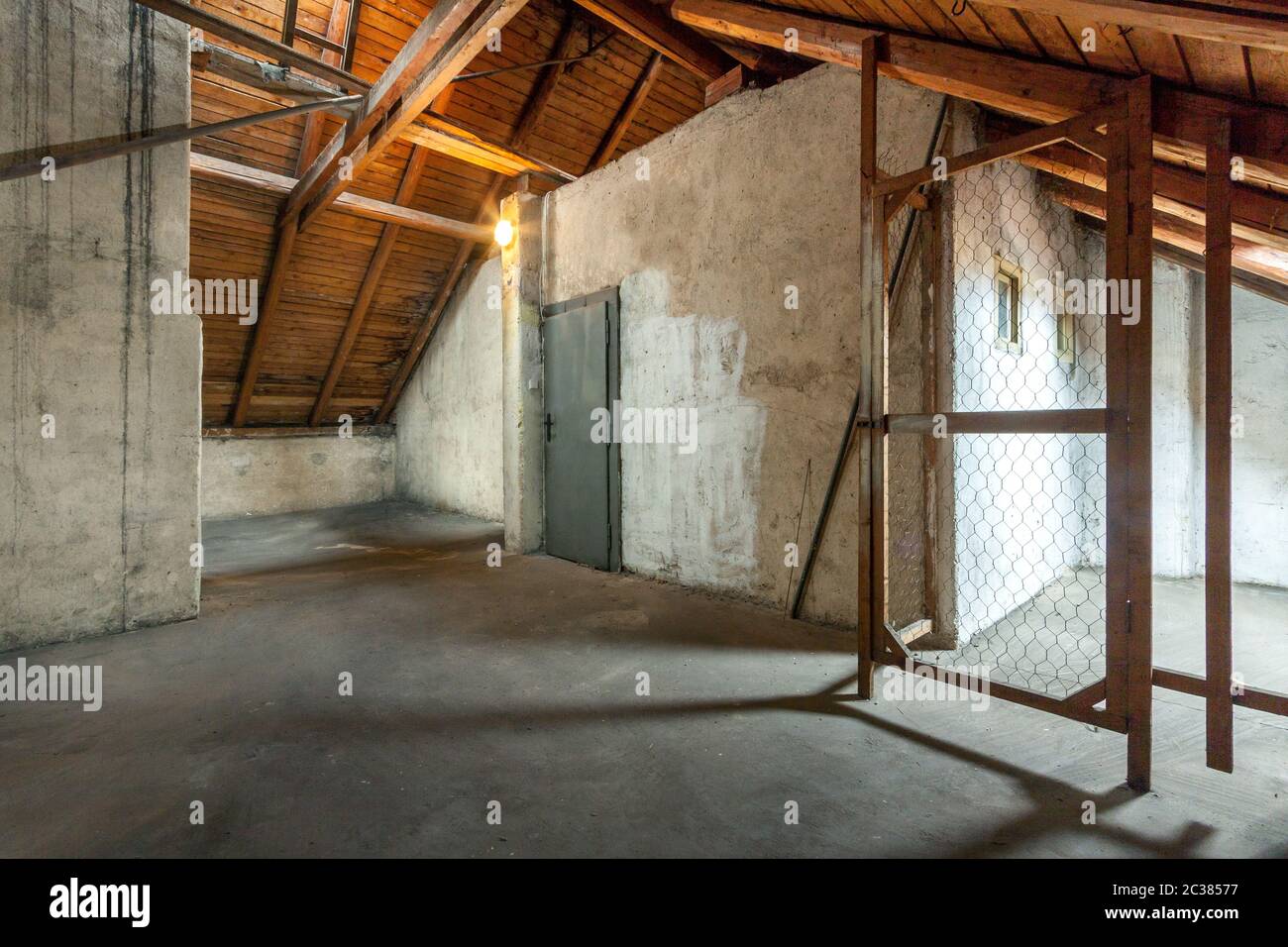 Empty old rustic attic with door. High quality photo Stock Photo - Alamy