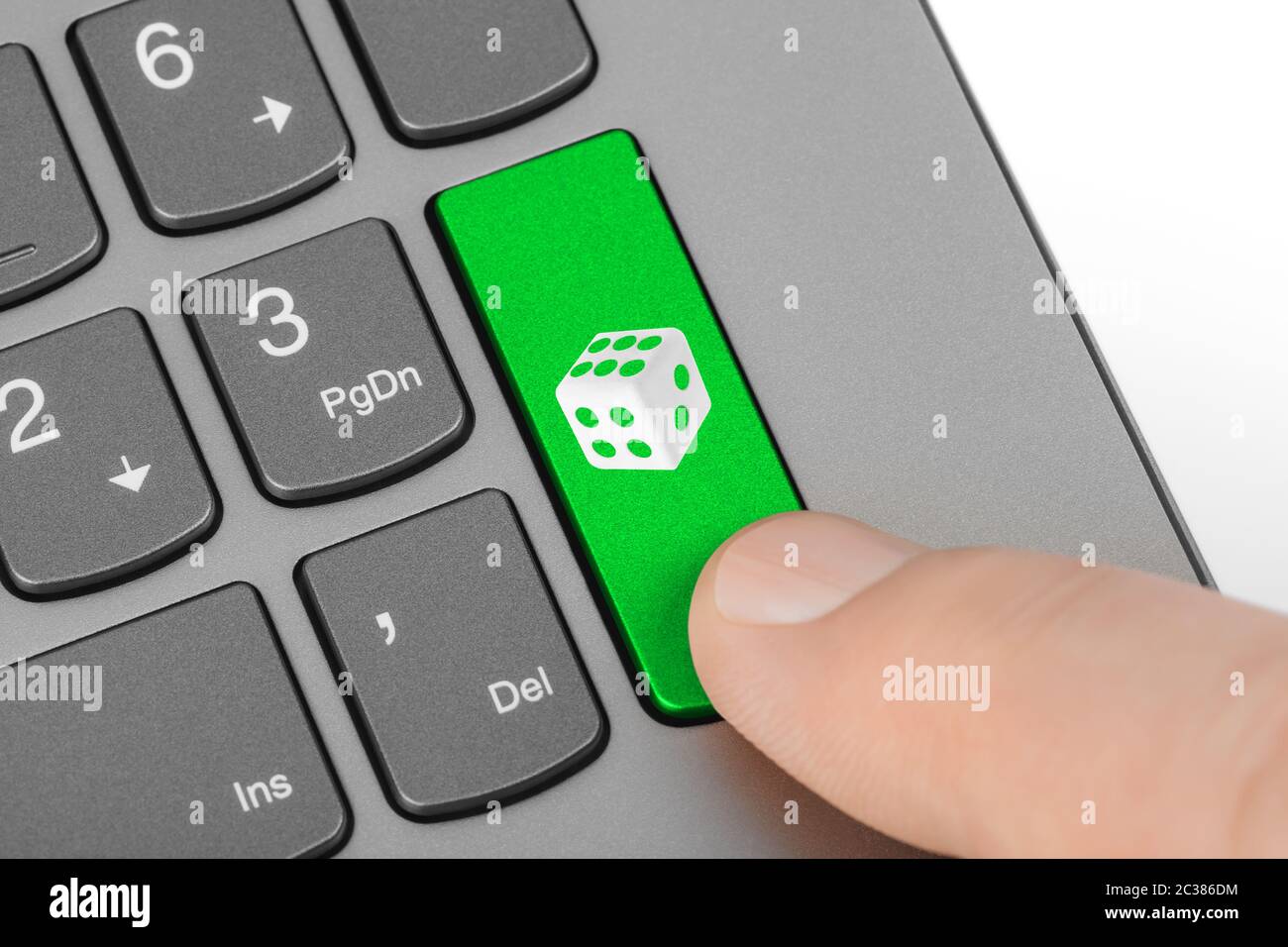 Computer keyboard with dice key Stock Photo - Alamy