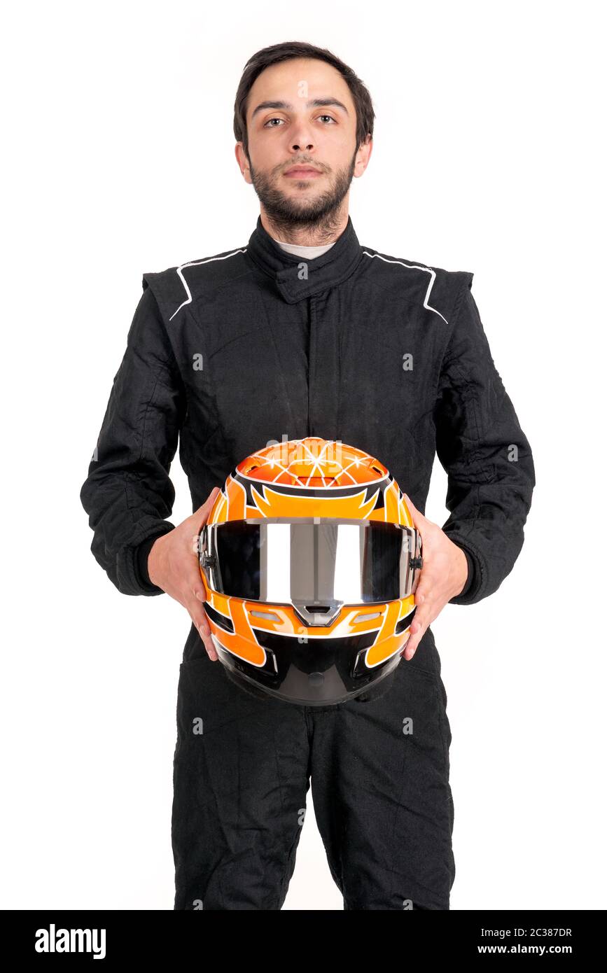 Racing driver posing with helmet isolated in white Stock Photo - Alamy
