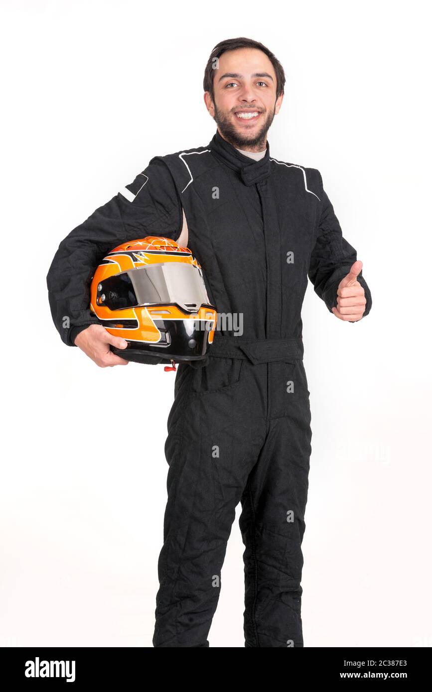 Racing driver posing with helmet isolated in white Stock Photo - Alamy