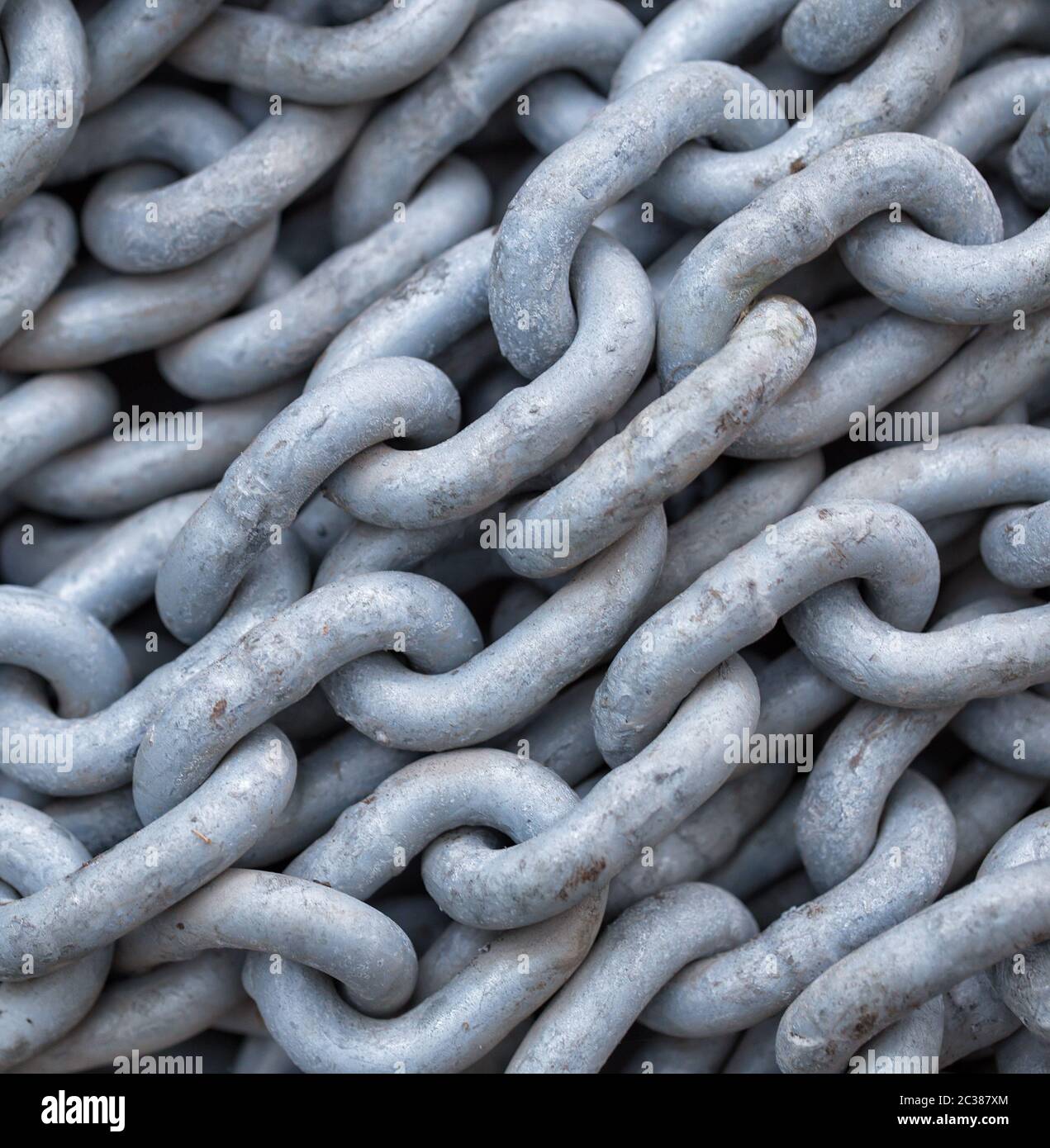 Metal chain close up shot for background Stock Photo - Alamy