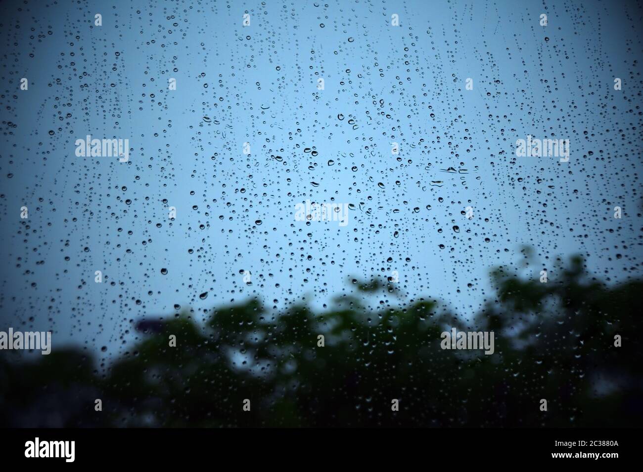 Rain droplets on glass Stock Photo - Alamy