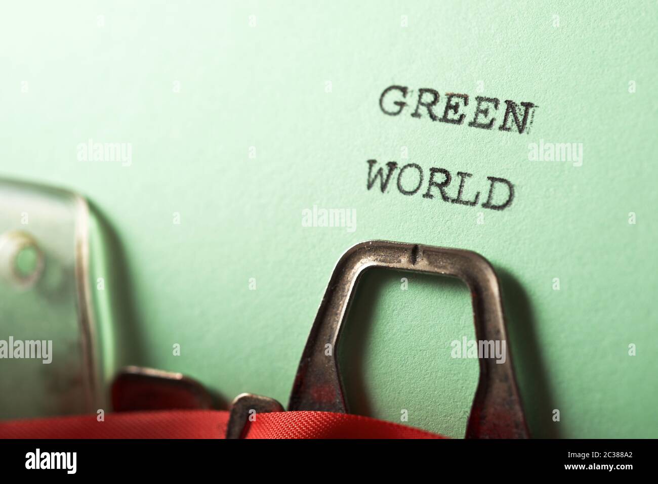 Green world text written with a typewriter Stock Photo - Alamy