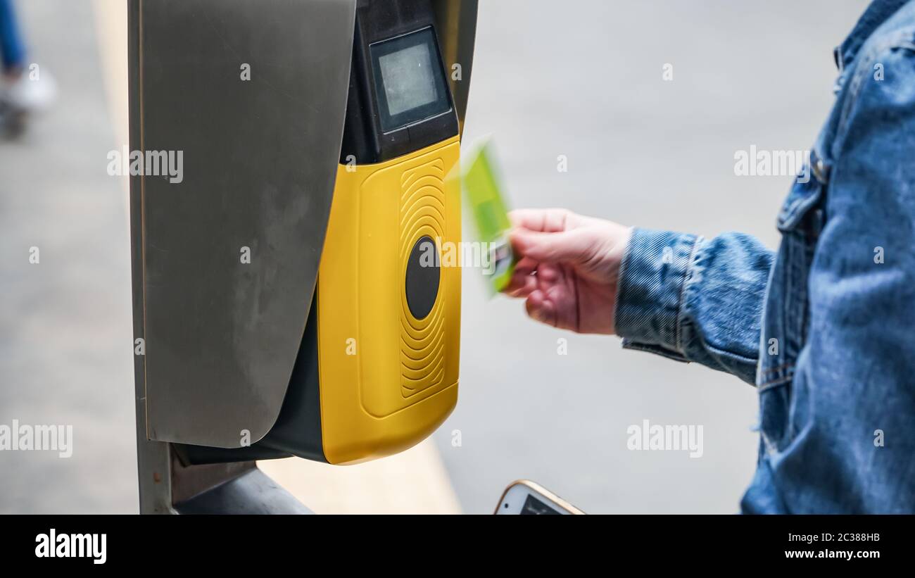 Passengers validating tickets, rush to the train, public transport ...