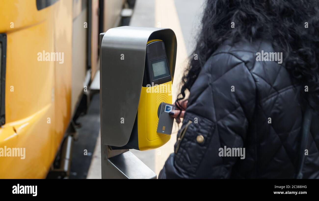 Passengers validating tickets, rush to the train, public transport ...