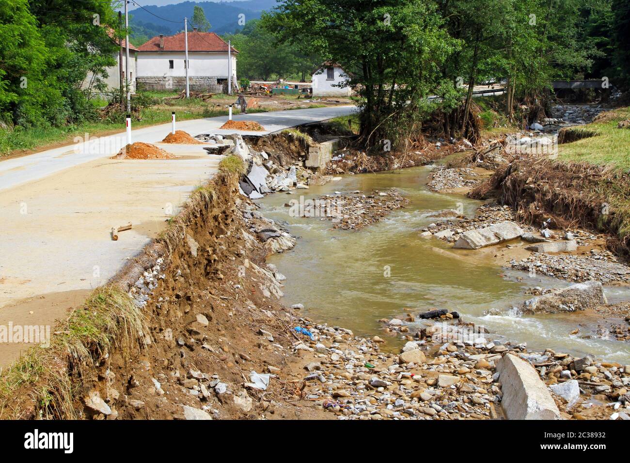 Side of a local road after natural disaster Stock Photo - Alamy