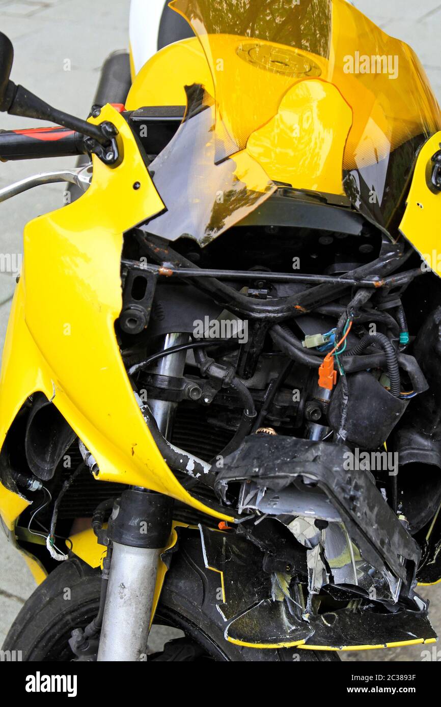 Crushed front of motorcycle in traffic accident Stock Photo - Alamy