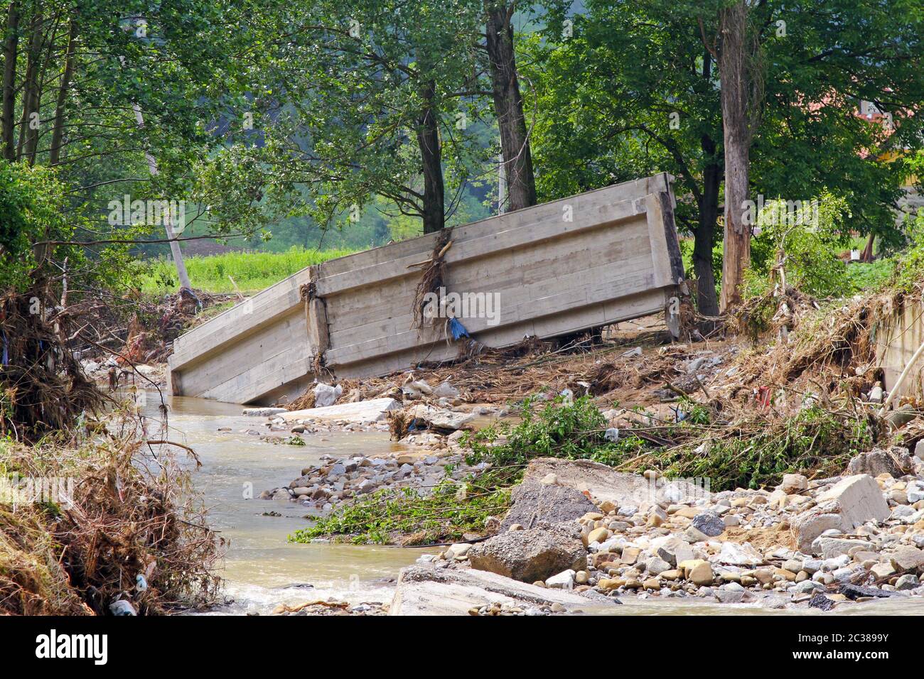 Old bridge distroyed in natural disaster flooding Stock Photo - Alamy