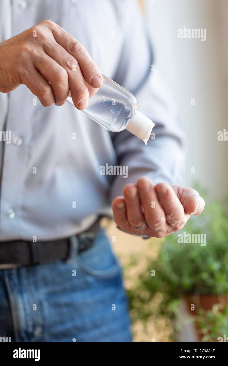 How to use hand sanitizer hi-res stock photography and images - Alamy