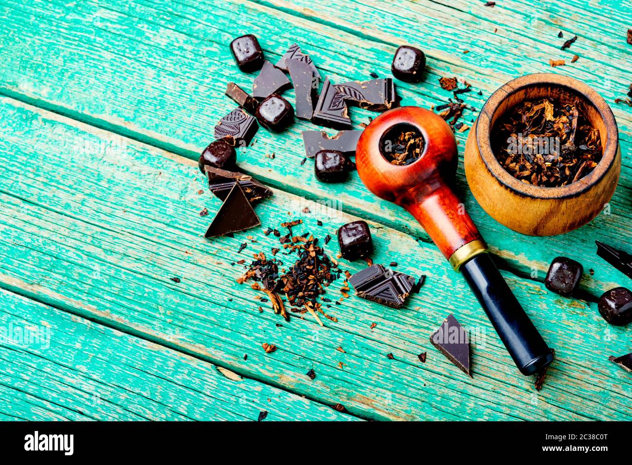 Chocolate flavored tobacco for smoking pipes.Tobacco pipe filled with ...