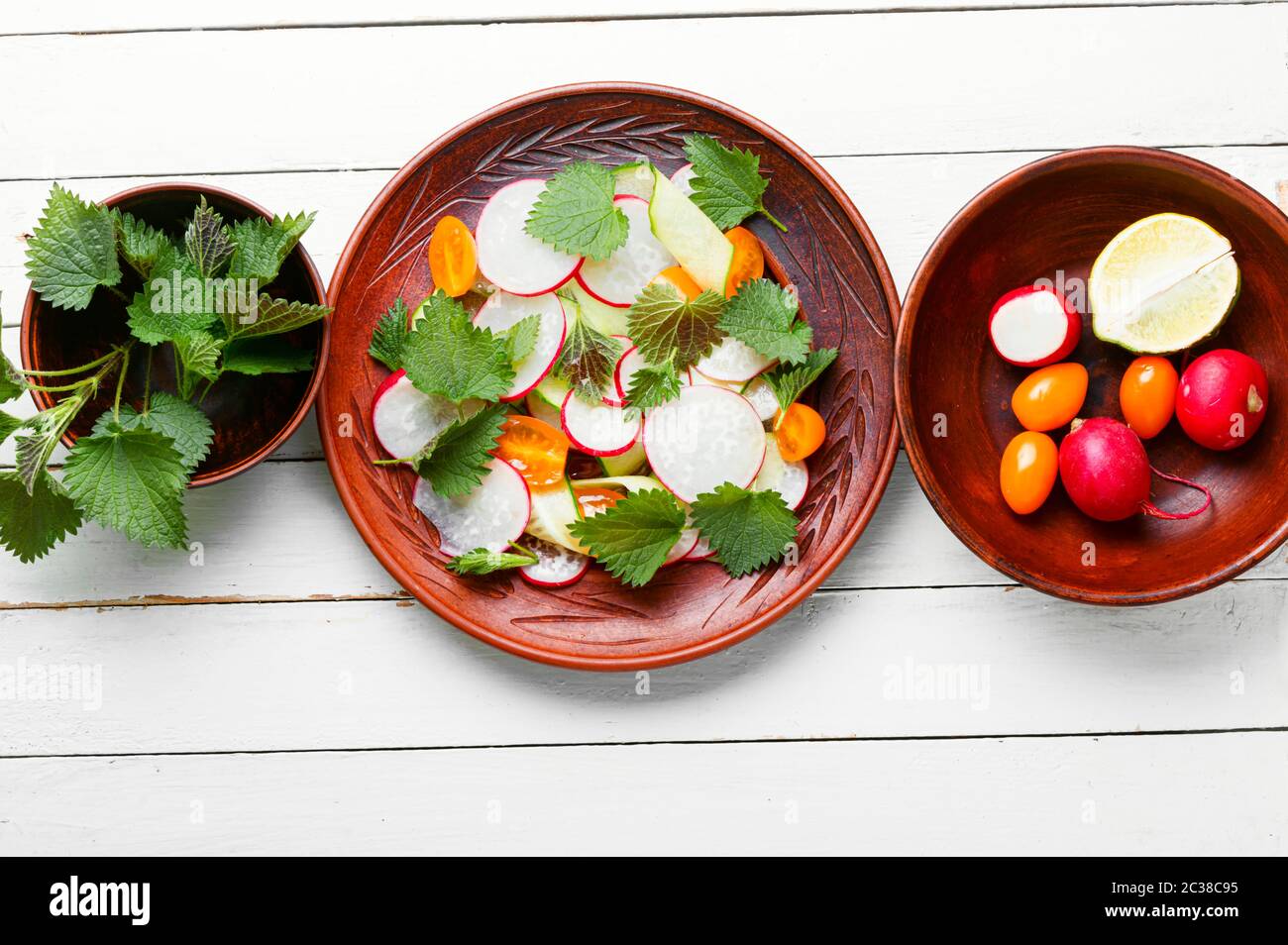 Delicious vegetable salad of nettle on plate.Healthy food concept Stock ...