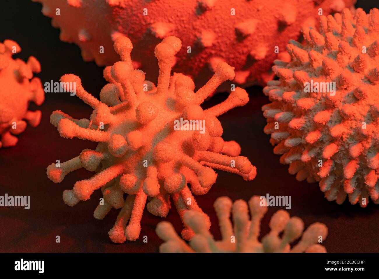 picture of some colorful illuminated symbolic viruses in dark back ...