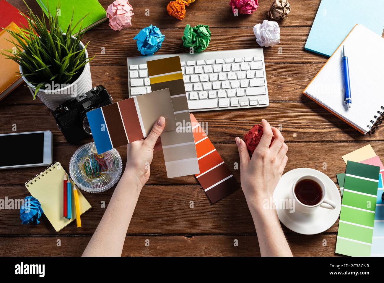 Web designer choosing colors from swatches Stock Photo - Alamy