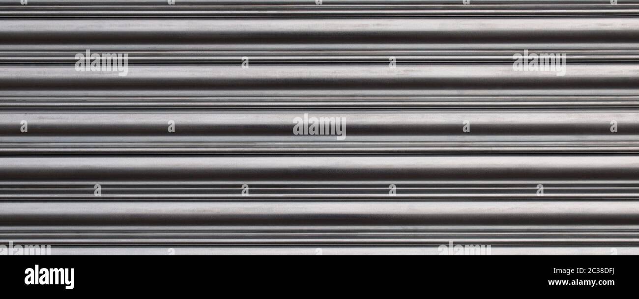 Corrugated steel shutter useful as a background Stock Photo - Alamy