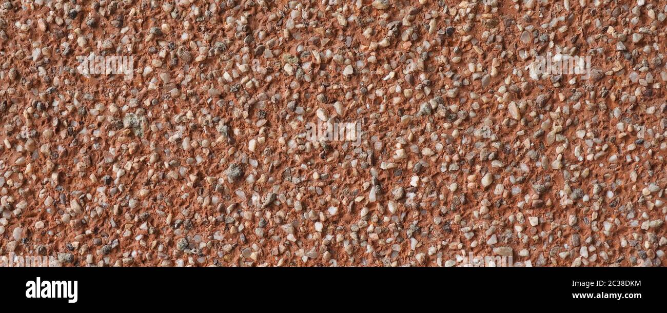 red brick with sand texture useful as a background Stock Photo - Alamy