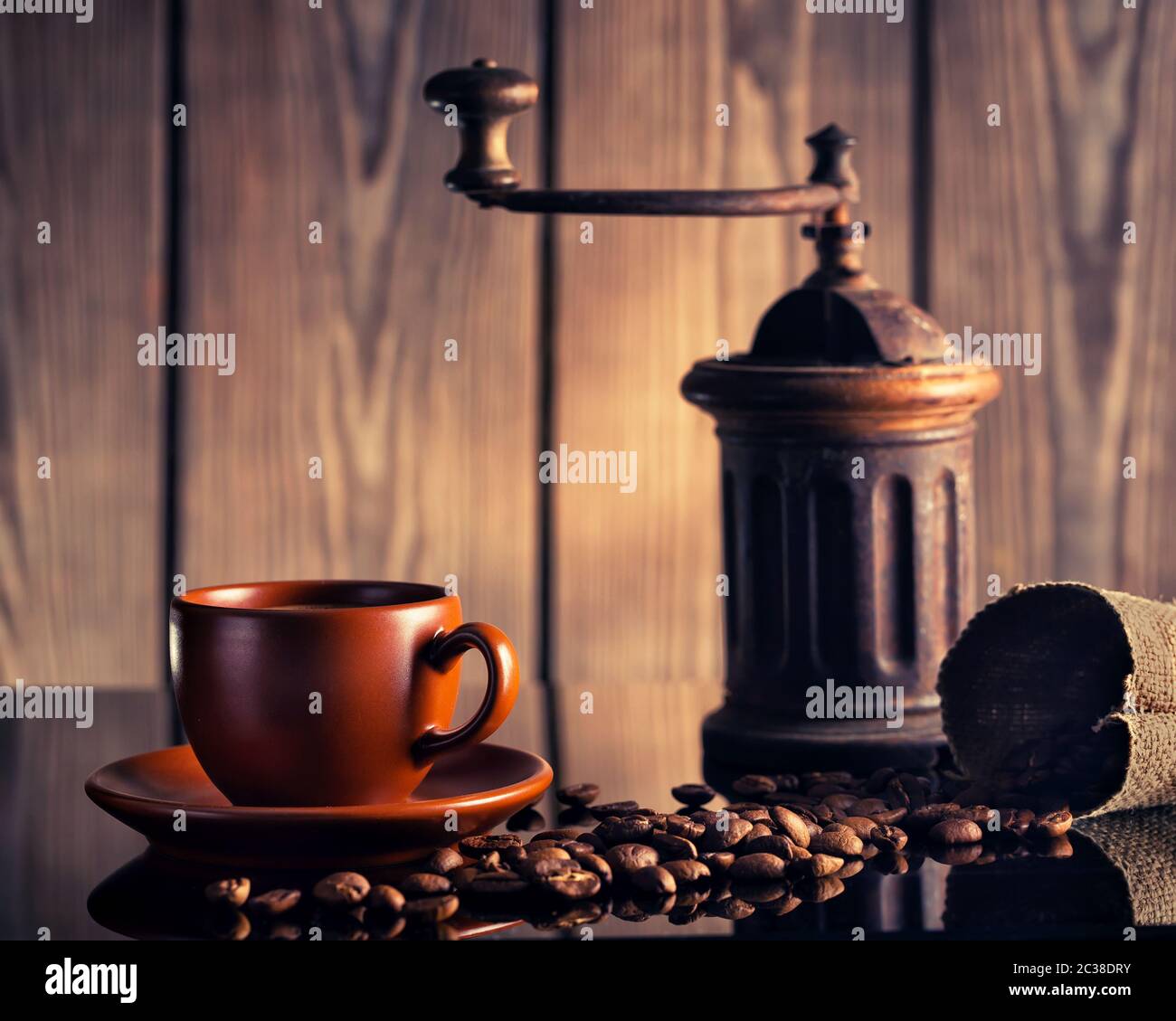 Coffee still life with an old coffee grinder and a cup of coffee Stock ...