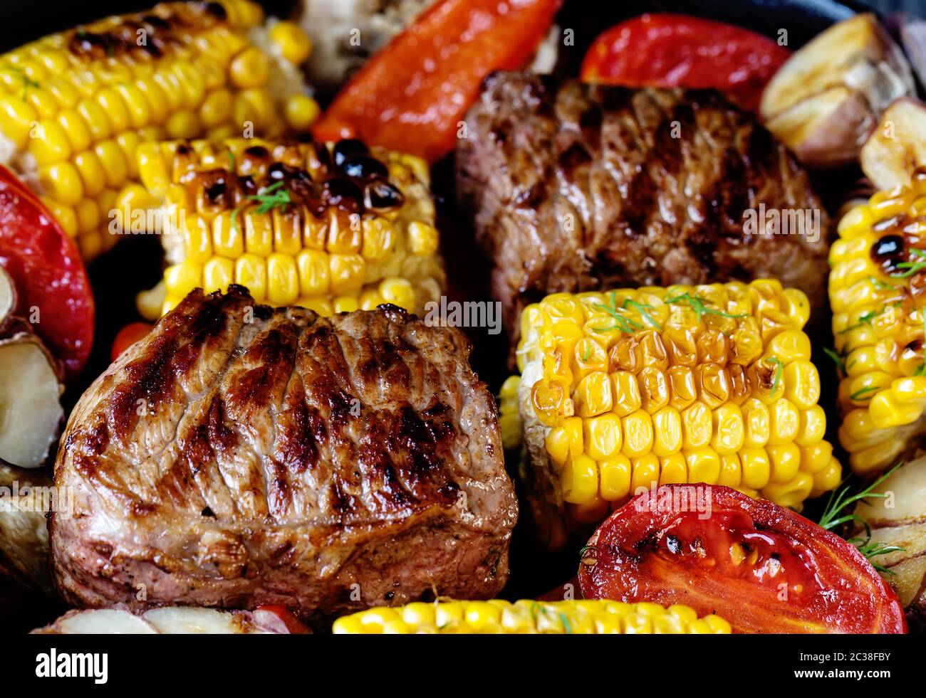 Food background of baked meat and corn. The concept of healthy natural ...