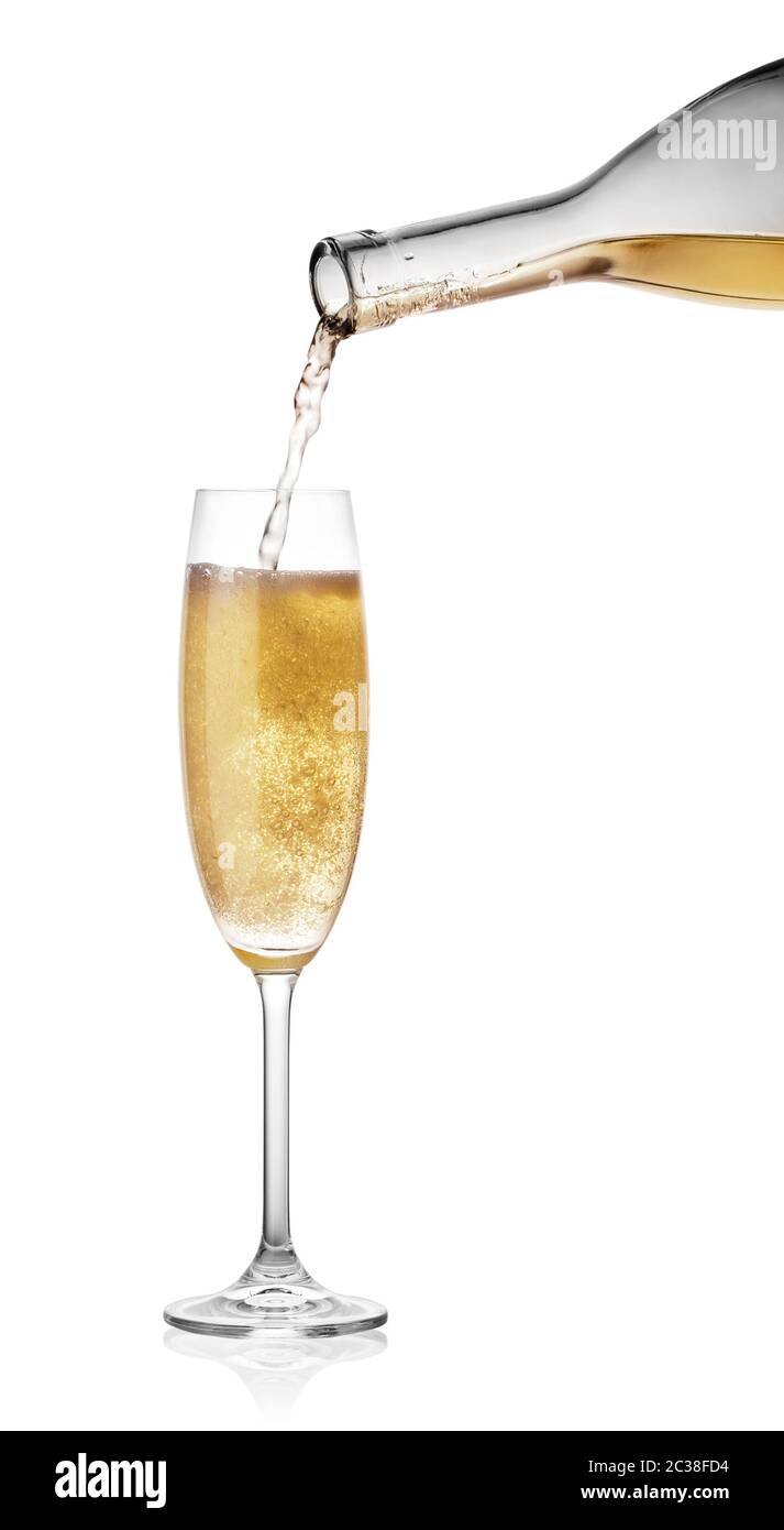 Pouring champagne from a bottle in a glass isolated on white background ...