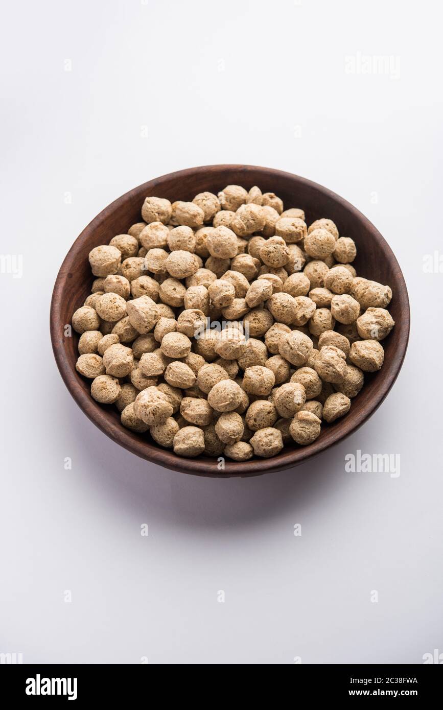 Raw Soya Chunks, Soy Meat for vegans isolated on colourful background ...